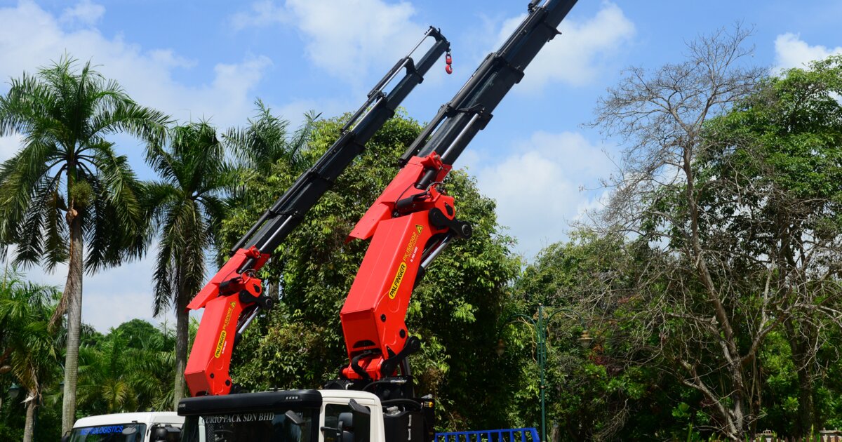 Handover of the 2 largest PALFINGER Loader Cranes in
