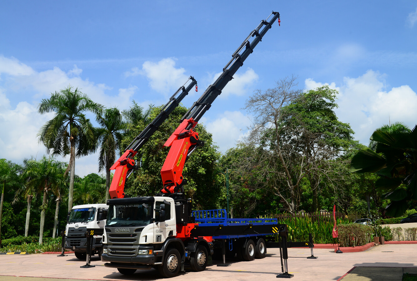 Handover of the 2 largest PALFINGER Loader Cranes in
